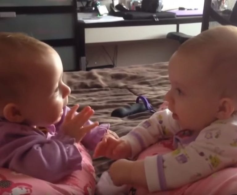 Sweet Twins Hold Hands As They Have Their First Conversation