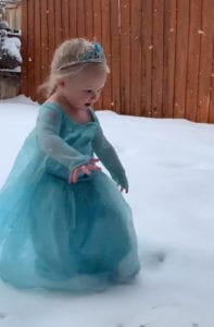Little girl dressed as Elsa “finally got some snow to do her scene”