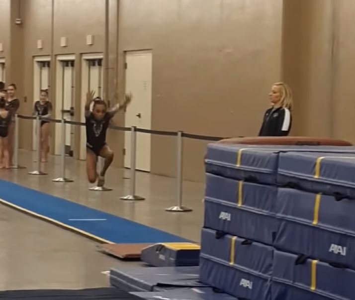 Coach Catches Gymnast Right Before Fall