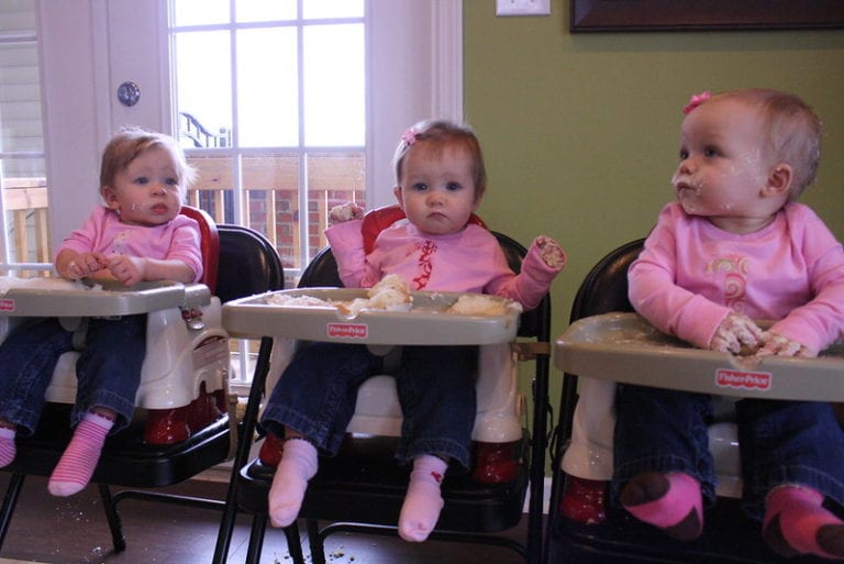 Triplets ‘face off’ in race to bottles when they know it’s time to eat