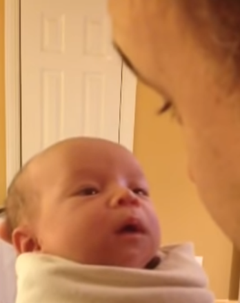 Baby Listens Intently To Daddy’s Questioning
