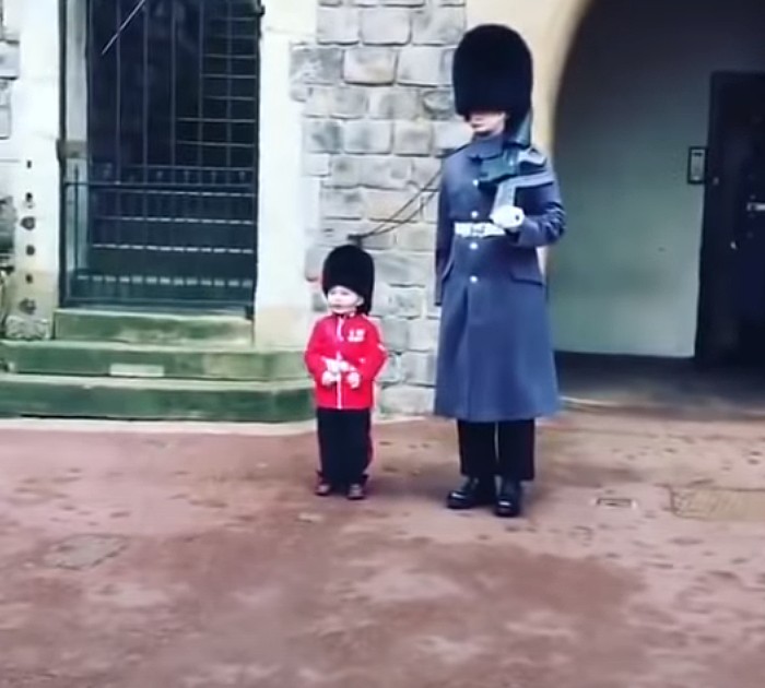 Guardsmen At Windsor Castle Break Formation For Young Boy