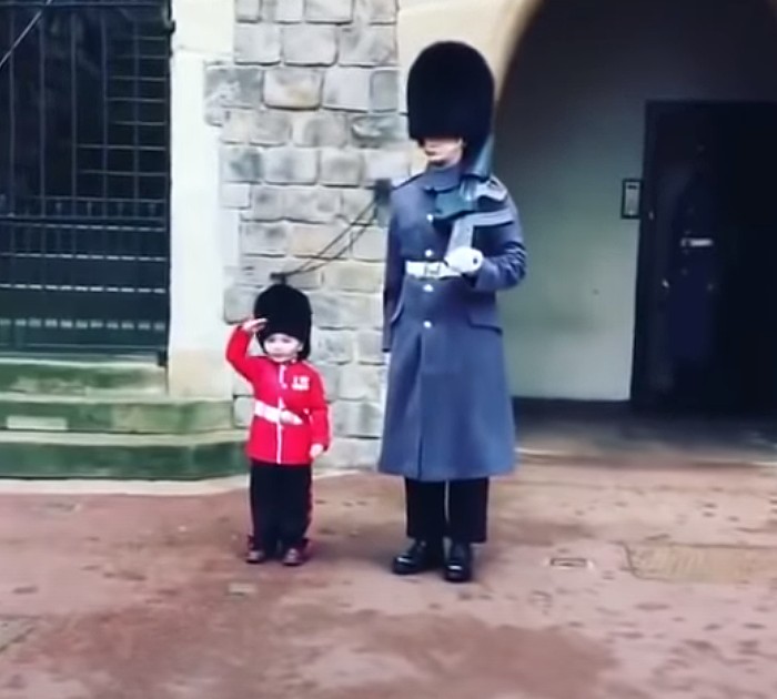 Guardsmen At Windsor Castle Break Formation For Young Boy