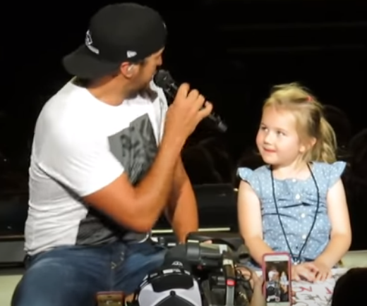 Adorable Little Girl Steals Spotlight At Luke Bryan’s Show