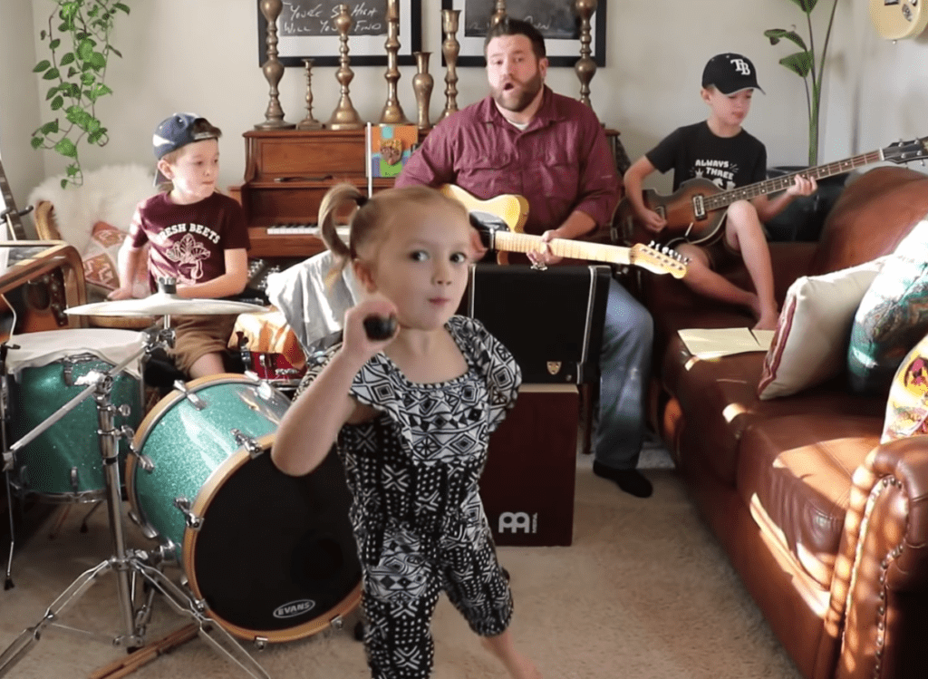 Little girl steals spotlight with epic dance moves during family band’s ...