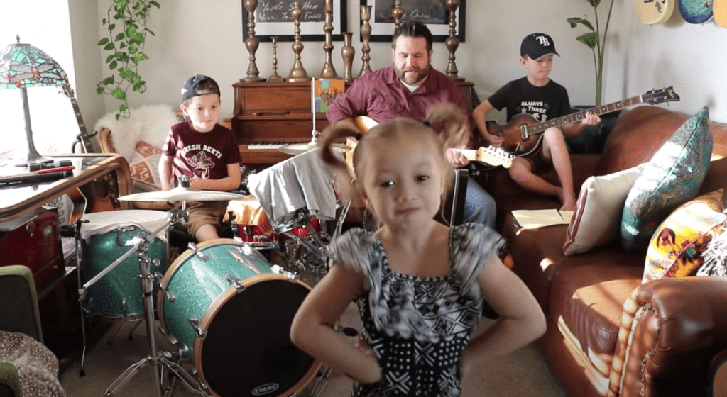 Little girl steals spotlight with epic dance moves during family band’s ...