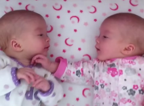 Twin Baby Girls Share an Adorable Heart to Heart