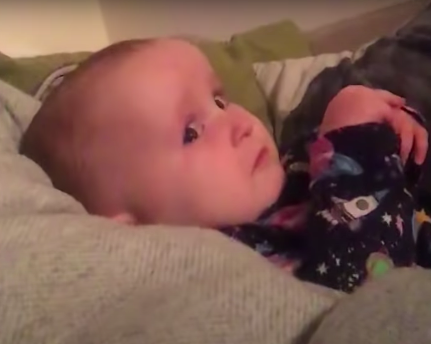 Baby clearly communicates how she feels about bath time