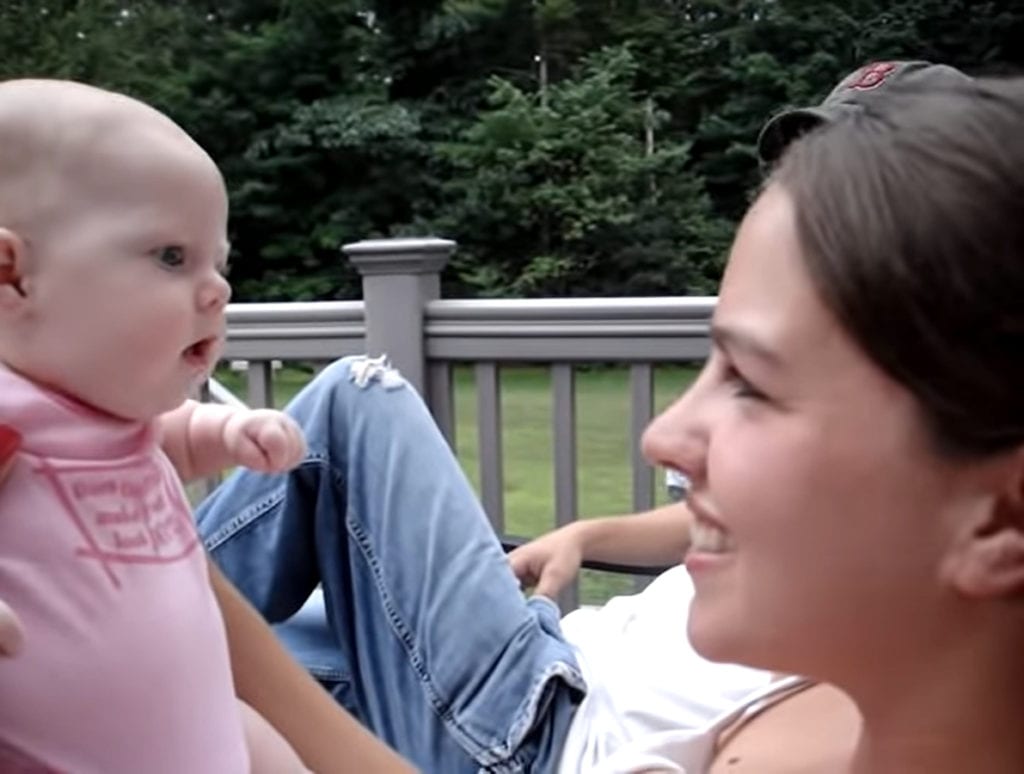 Funny baby girl growls at auntie