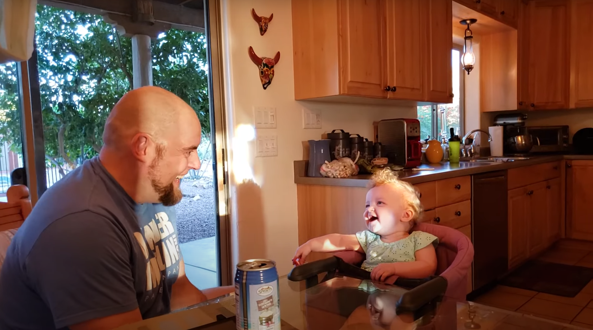 Baby girl keeps dad on edge with hilarious pacifier game