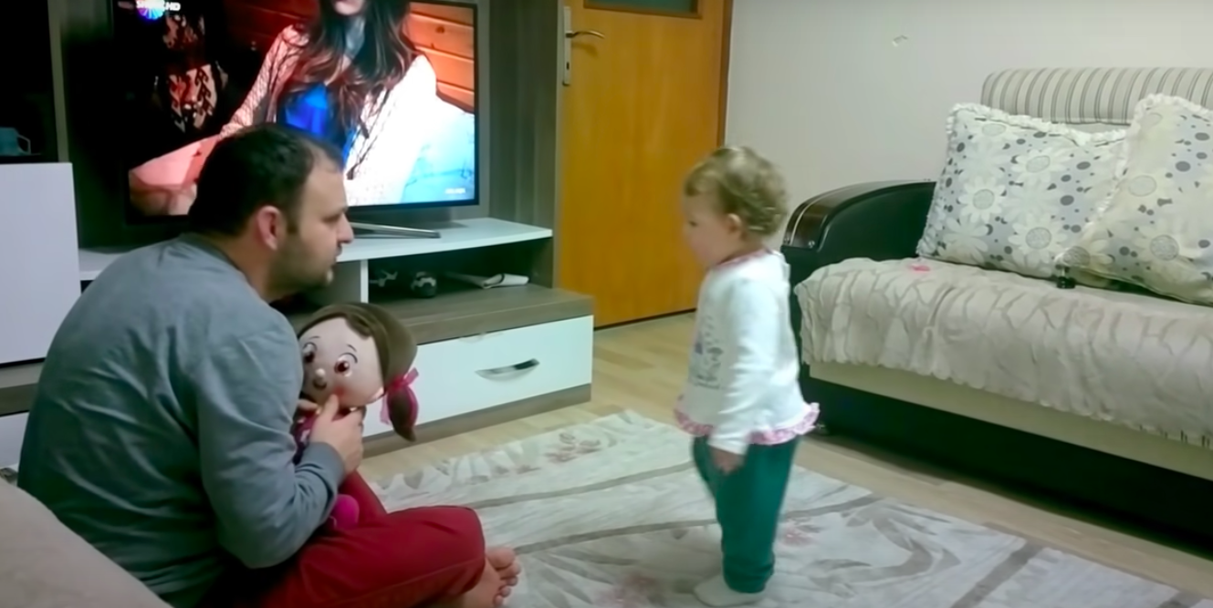 Baby girl gives dad a piece of her mind when he holds her doll