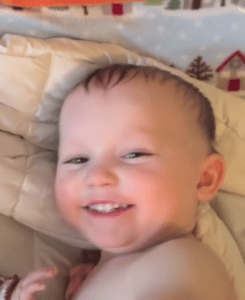 Older brother has cutest way to calm his crying baby sister