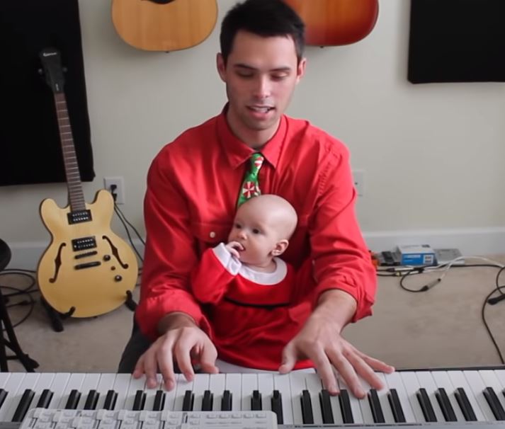 Daddy Melts Hearts With “Jingle Bells” Rewrite For Baby Girl