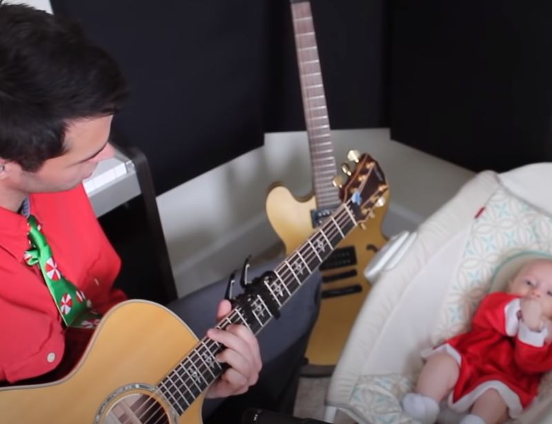 Daddy Melts Hearts With “Jingle Bells” Rewrite For Baby Girl