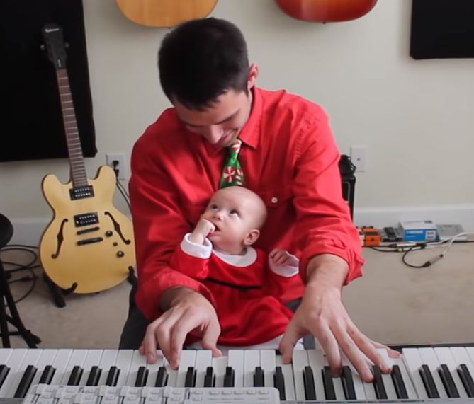 Daddy Melts Hearts With “Jingle Bells” Rewrite For Baby Girl