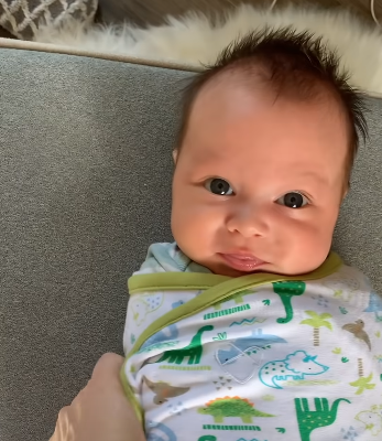 Little Baby Adorably Stretches After Being Unswaddled