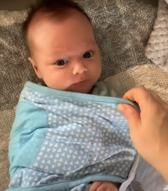 Little Baby Adorably Stretches After Being Unswaddled