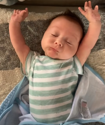 Little Baby Adorably Stretches After Being Unswaddled
