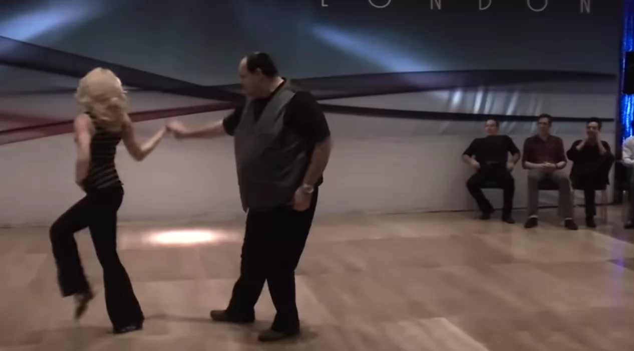 Husband watching on has to be held back when wife’s dance routine gets ...
