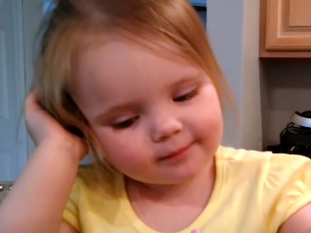 Toddler mimicking adults on the phone is an adorable mirror we’re not ...