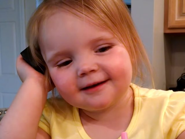 Toddler mimicking adults on the phone is an adorable mirror we’re not ...