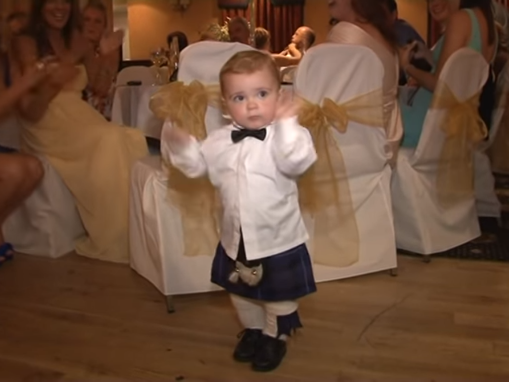 Adorable baby dances like a happy wee Scot at a wedding