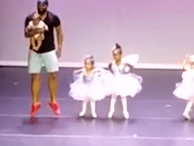 Stage fright struck toddler can’t face crowd until the best dad steps up