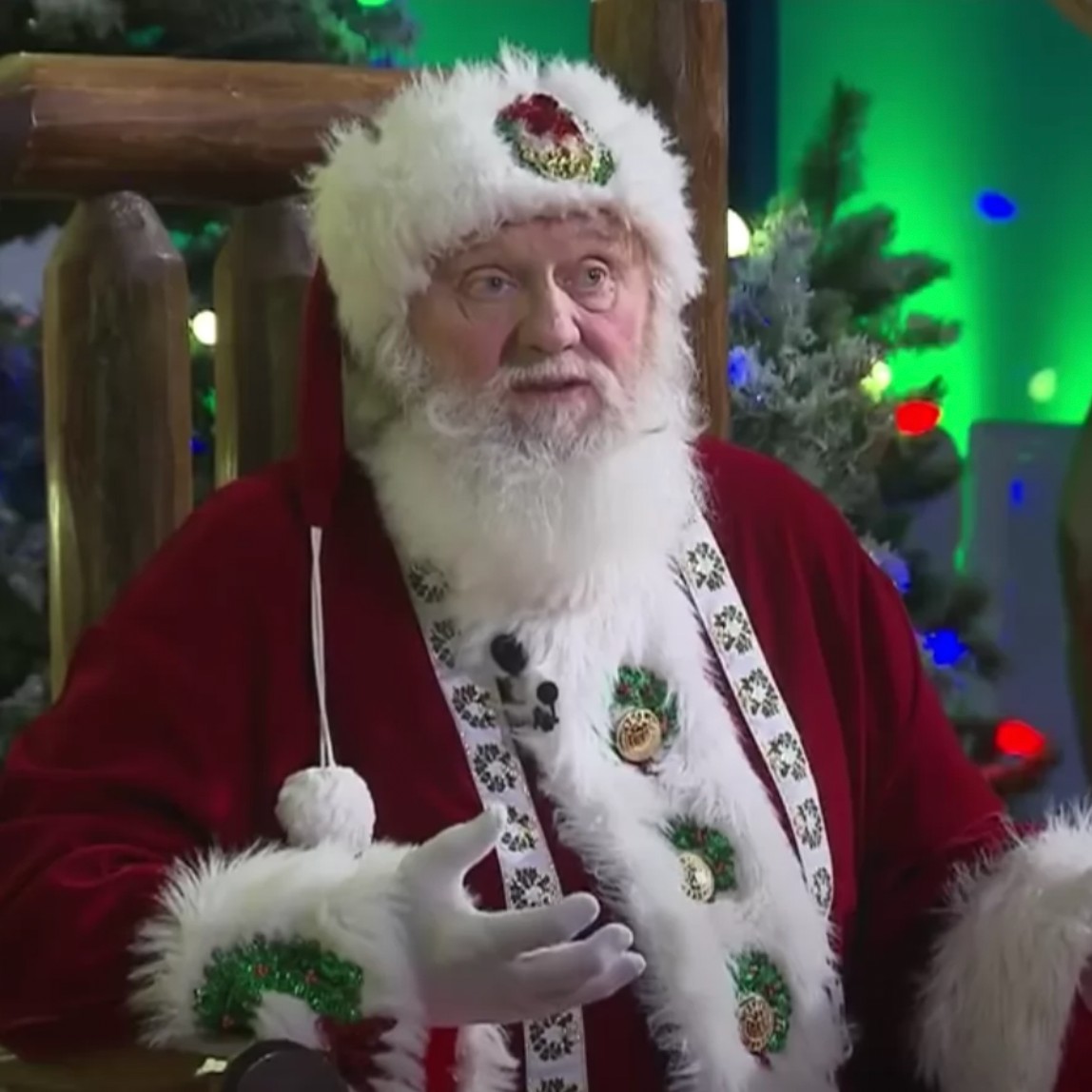 Santa and blind, autistic child having a soulful moment