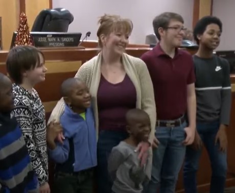 Single mom of two that grew up in foster care adopts 6 boys with slim ...