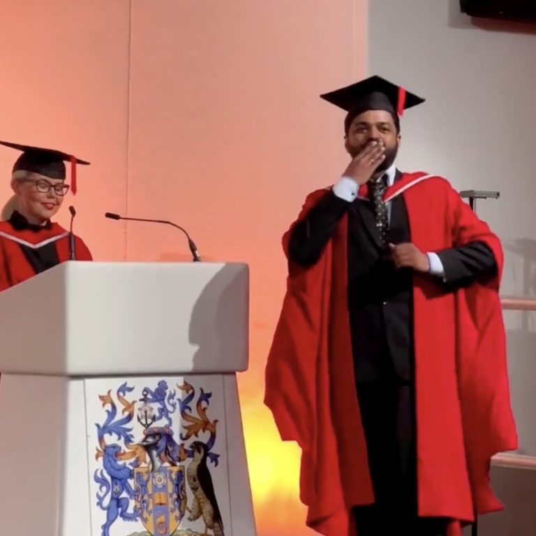 Little girl proudly cheers for daddy during his graduation and melts ...