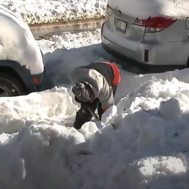 Exhausted kid wins hearts with his funny reaction to shoveling snow