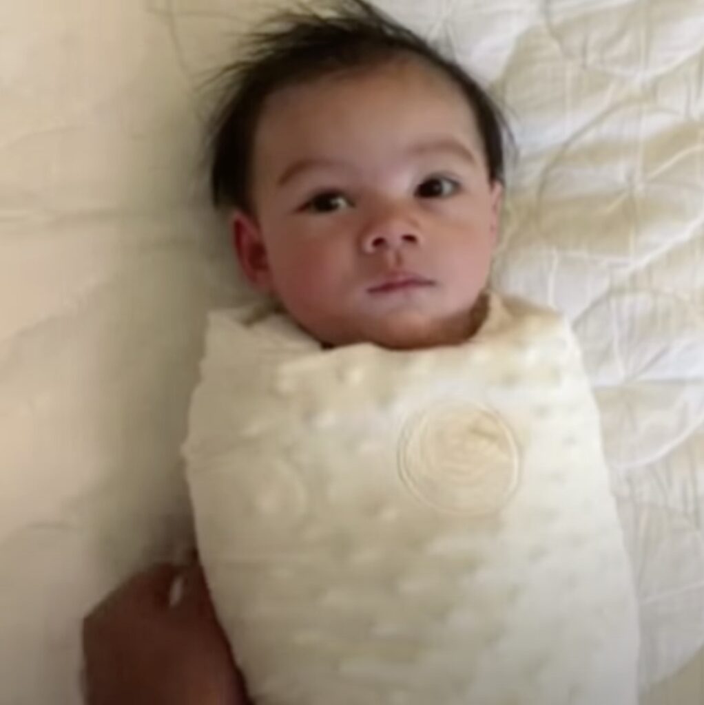 Baby is released from swaddle and his reaction has the internet applauding