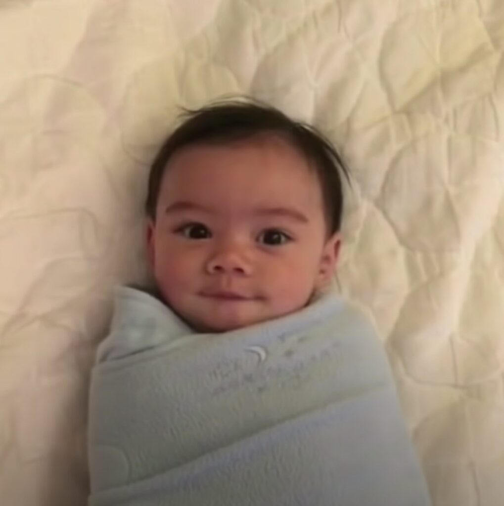 Baby is released from swaddle and his reaction has the internet applauding