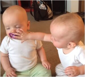 Twin baby girls go to war with each other over pacifier getting 832M views